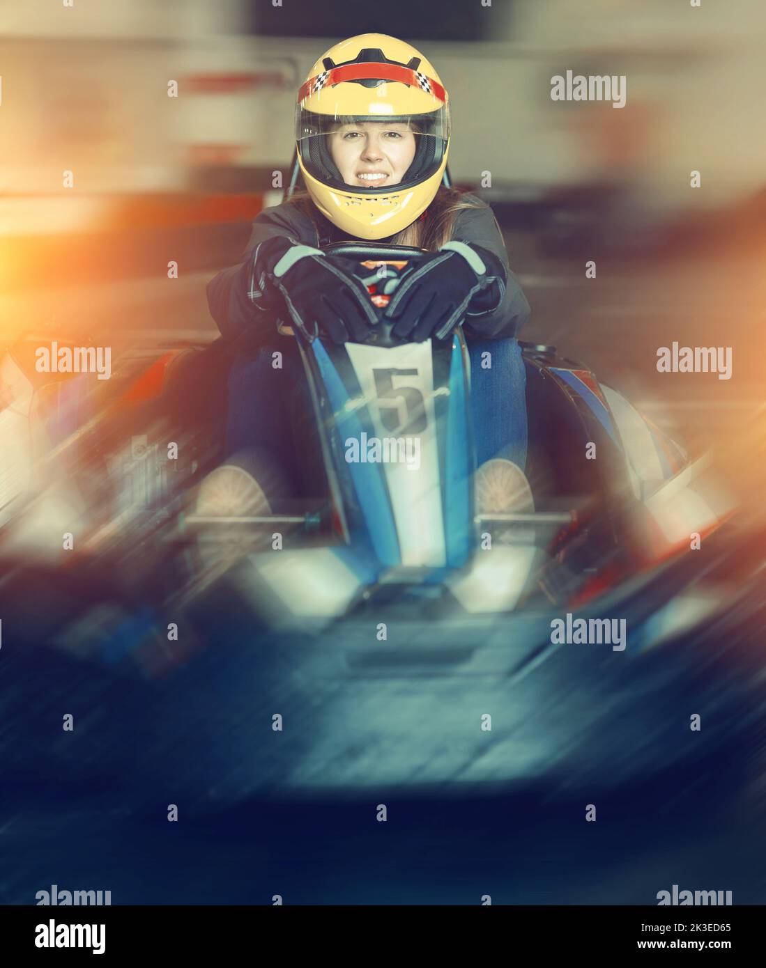 female go-cart racer posing at cart circuit Stock Photo - Alamy
