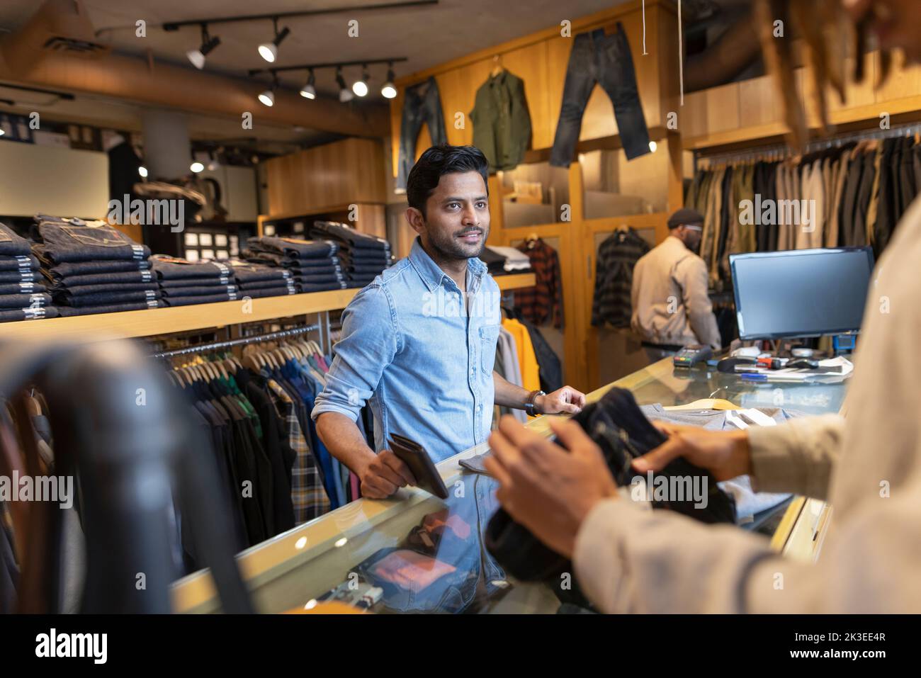 Buying counter hi-res stock photography and images - Alamy