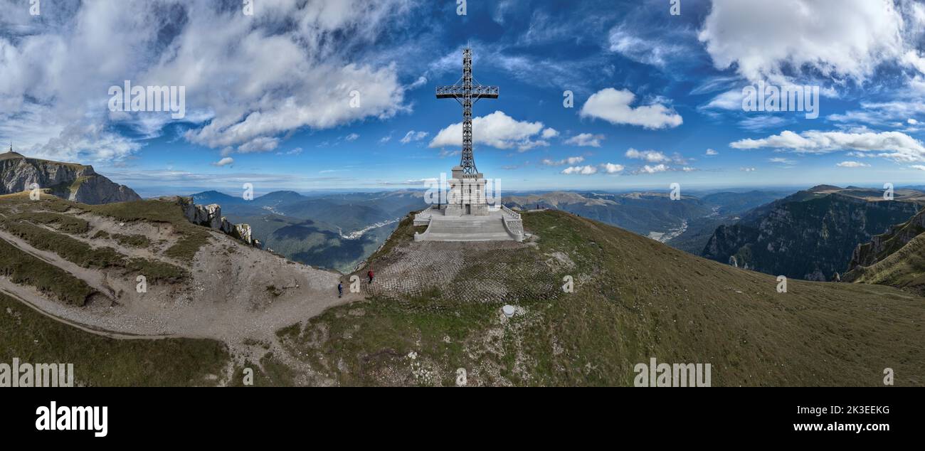 View of the Cross of Heroes on Mount Caraiman in the Bucegi Mountains ...