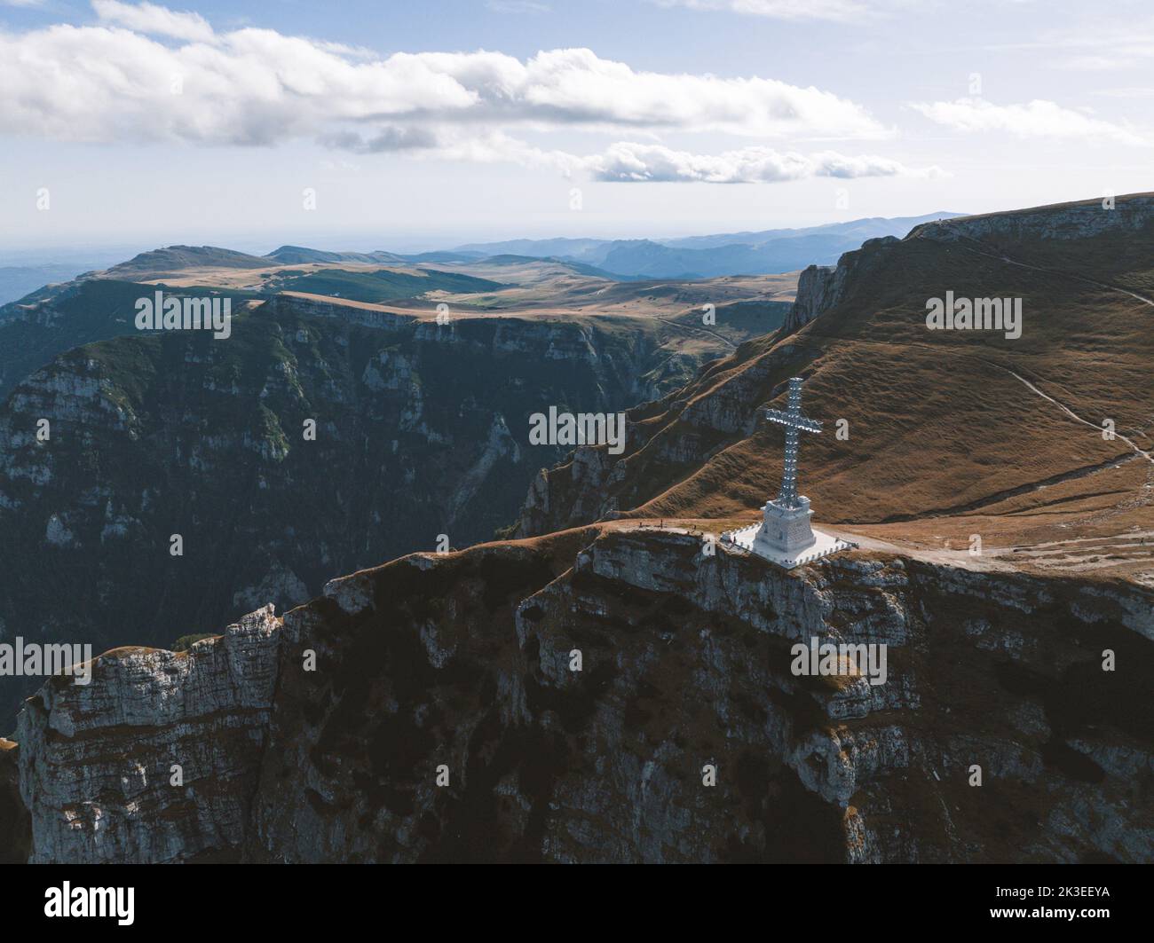 View of the Cross of Heroes on Mount Caraiman in the Bucegi Mountains ...