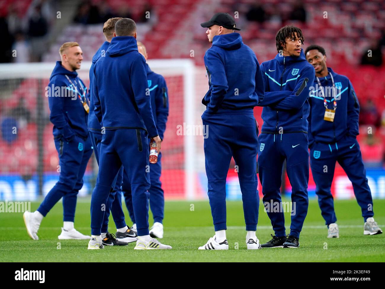 England's Trent Alexander-Arnold (second right) inspects the pitch ...