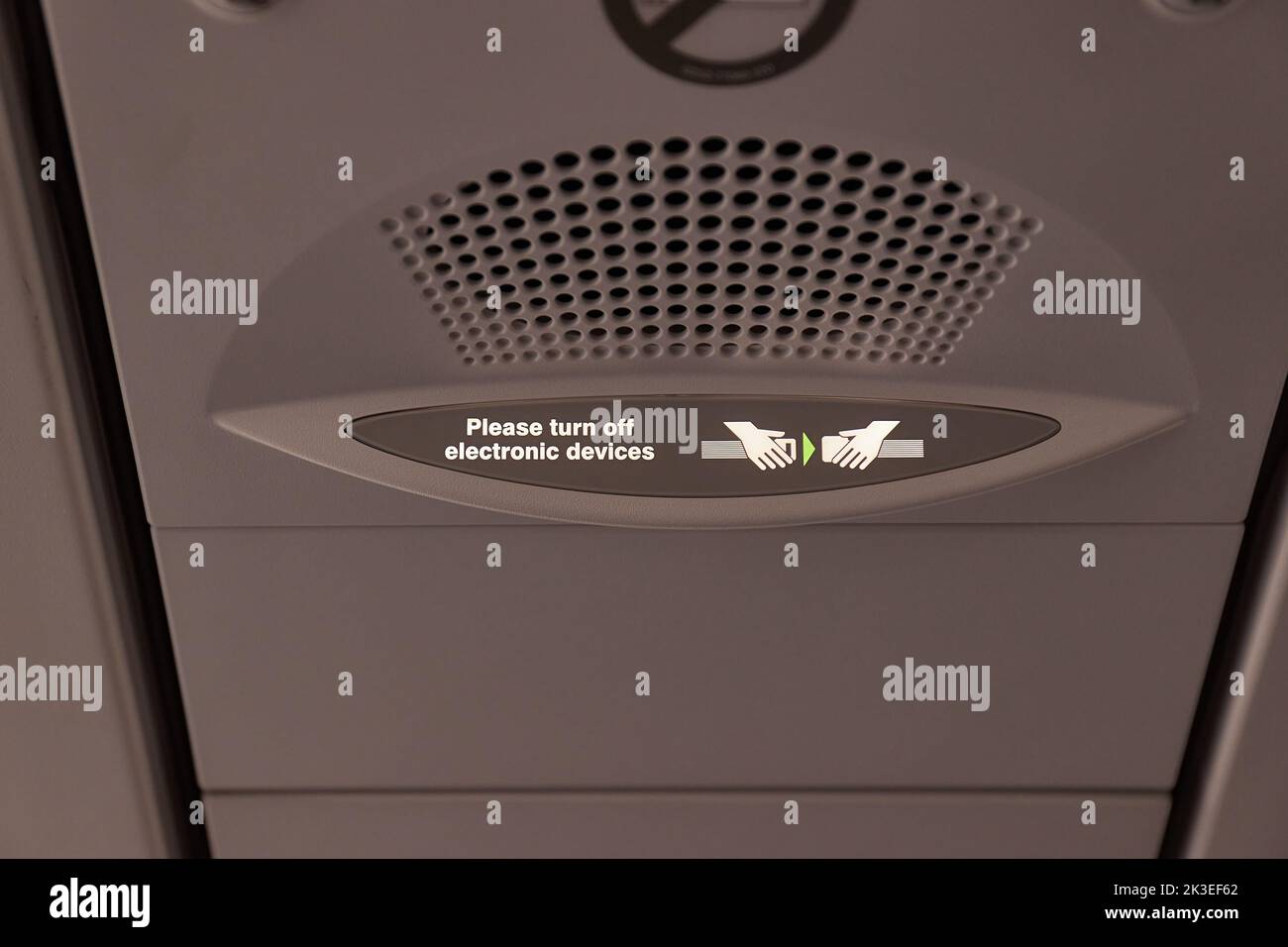 Plane cabin signs Stock Photo - Alamy