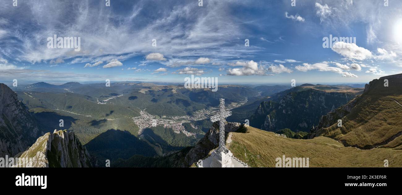 View of the Cross of Heroes on Mount Caraiman in the Bucegi Mountains ...