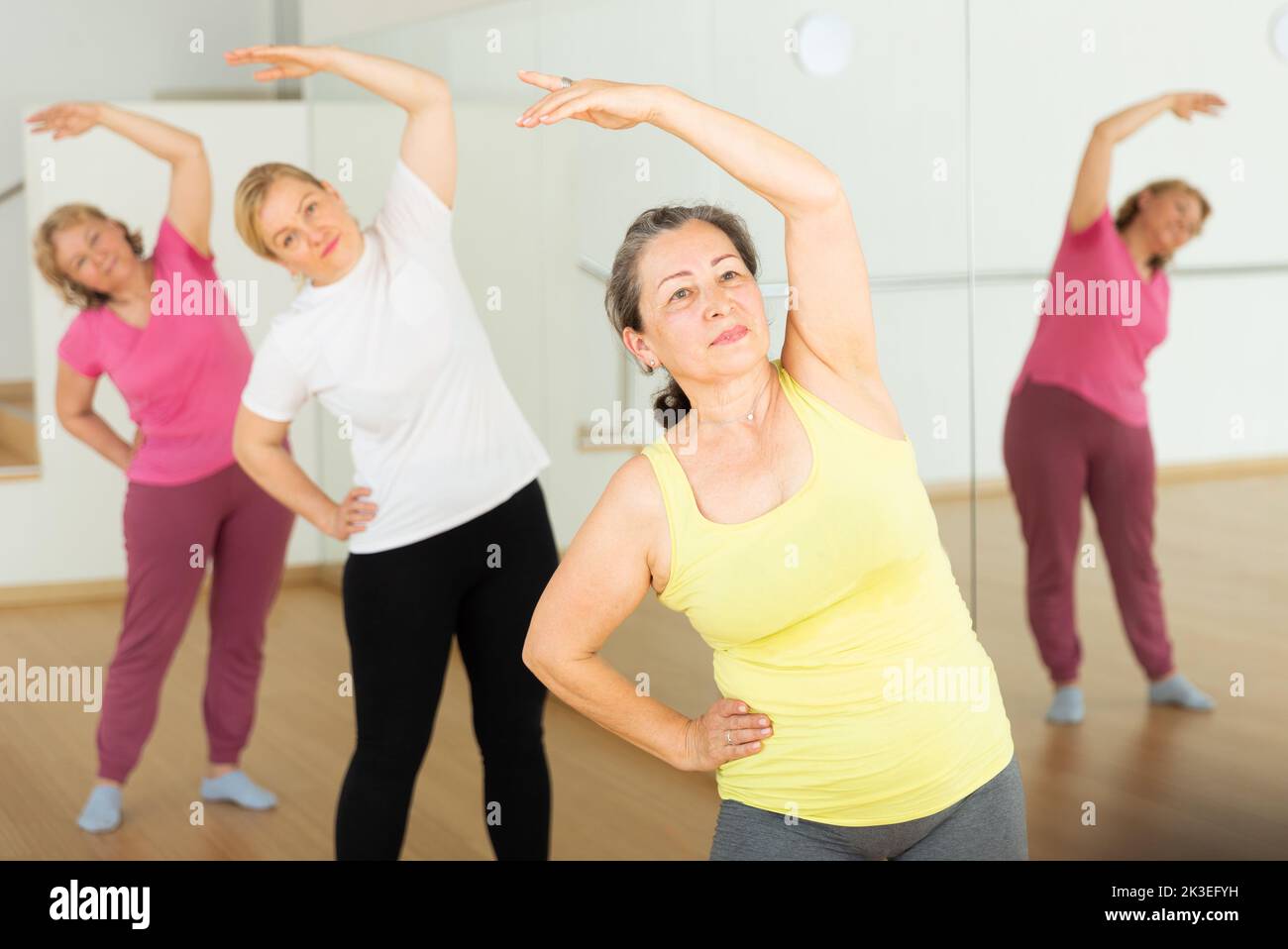 Mature women dancing aerobics at lesson in dance class Stock Photo - Alamy
