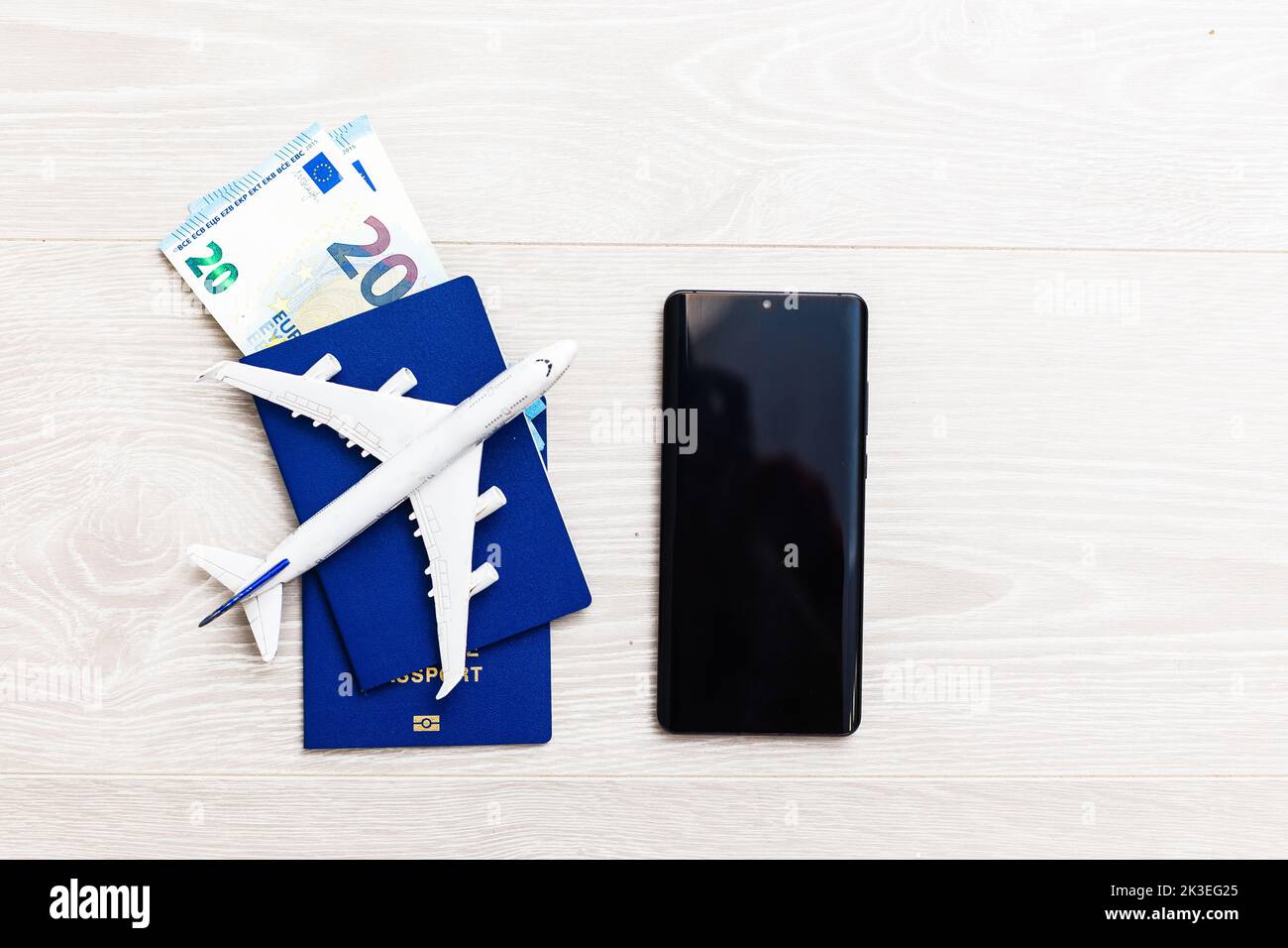 Mockup image of mobile smartphone , airplane and check book isolated on ...