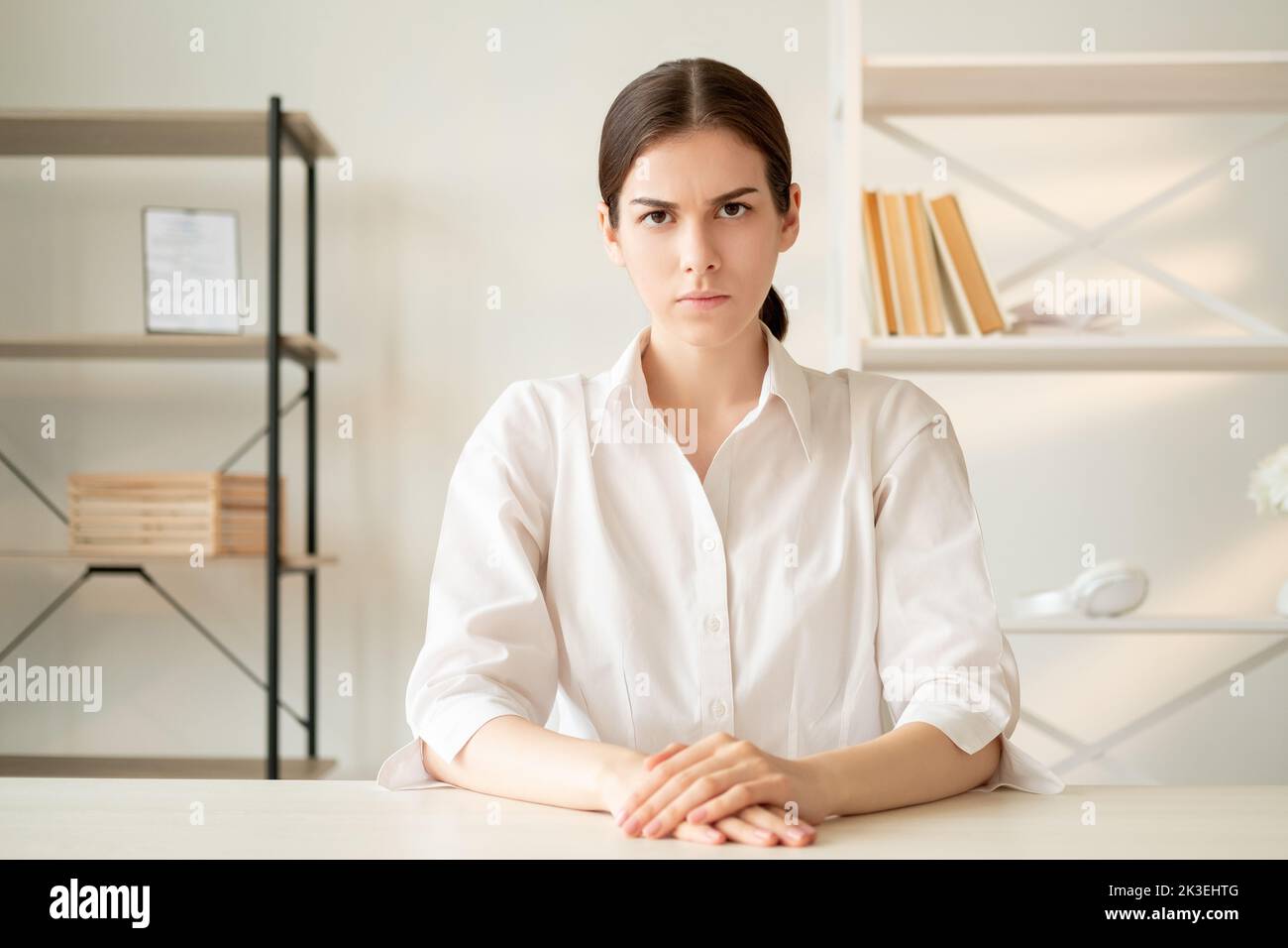 Strict looking woman hi-res stock photography and images - Alamy