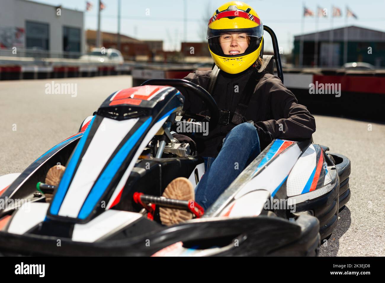 Female driving car for karting Stock Photo - Alamy