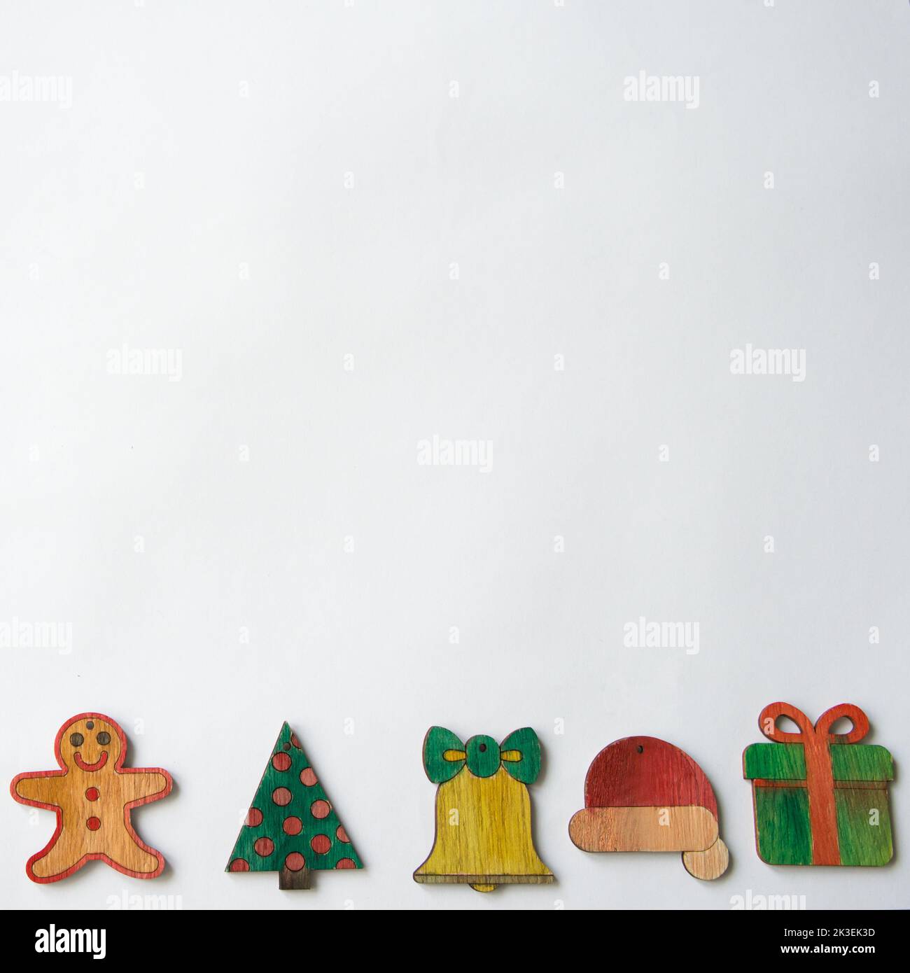 Christmas pattern with gingerbread man, tree, bell, santa hat and a ...