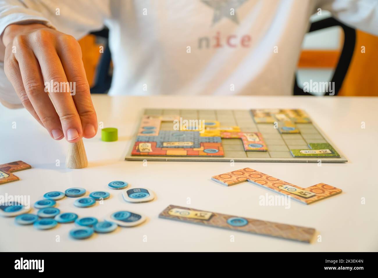 unrecognizable girl plays board game. leisure and fun free time Stock ...