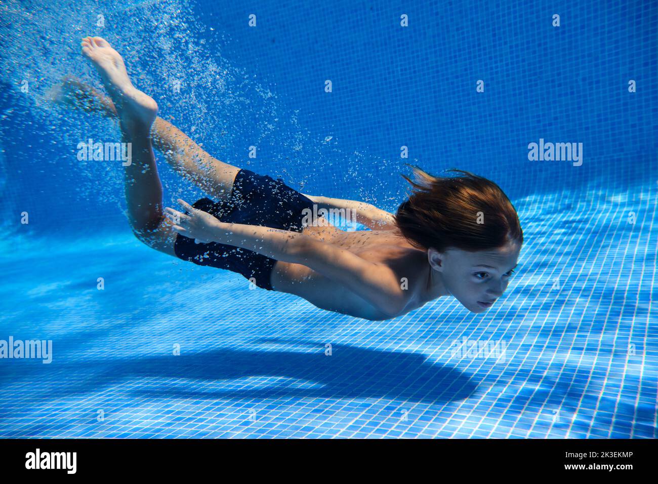 Forward dive in pool hi-res stock photography and images - Alamy