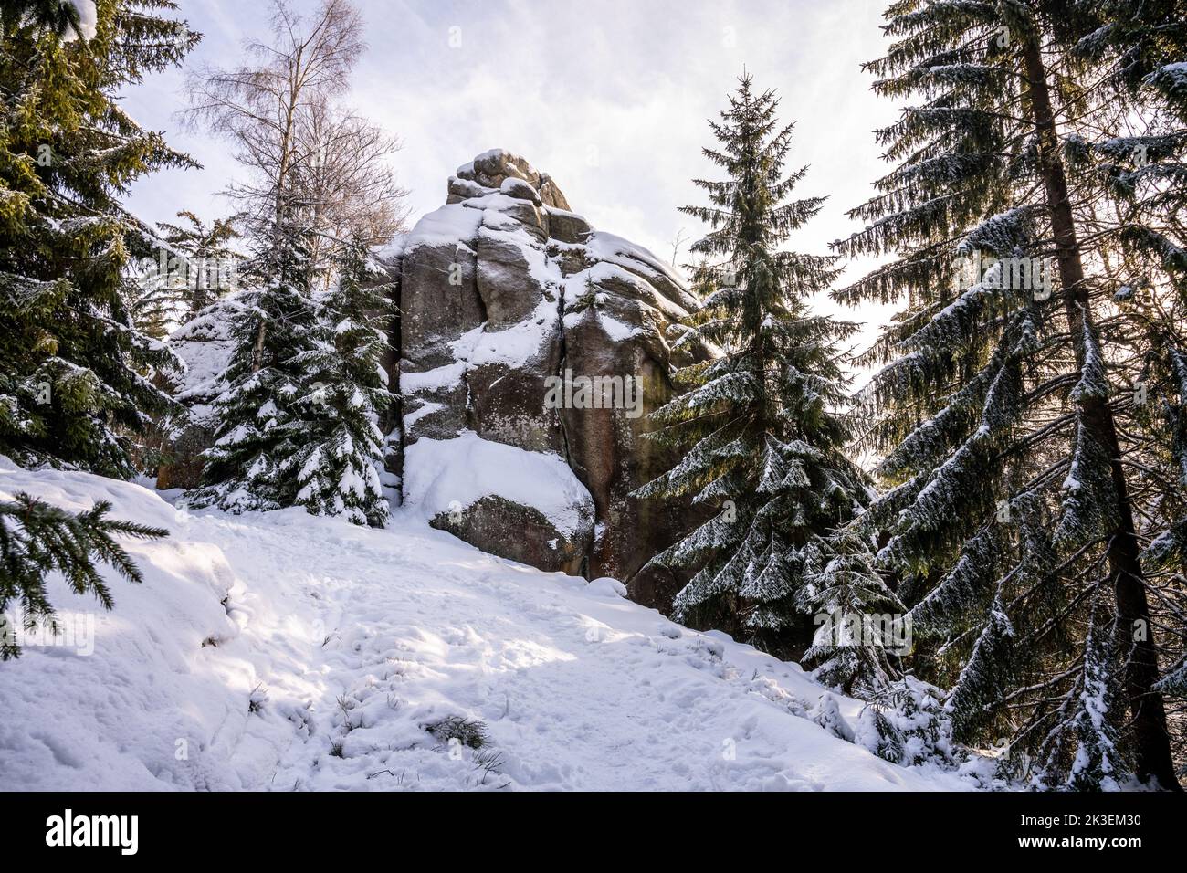 Granite rock formation covered by snow Stock Photo - Alamy