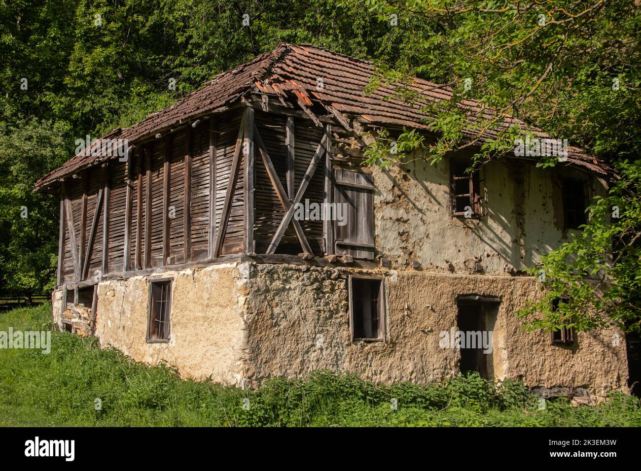 Haunted abounded old ruined empty house on country side, at the end of ...