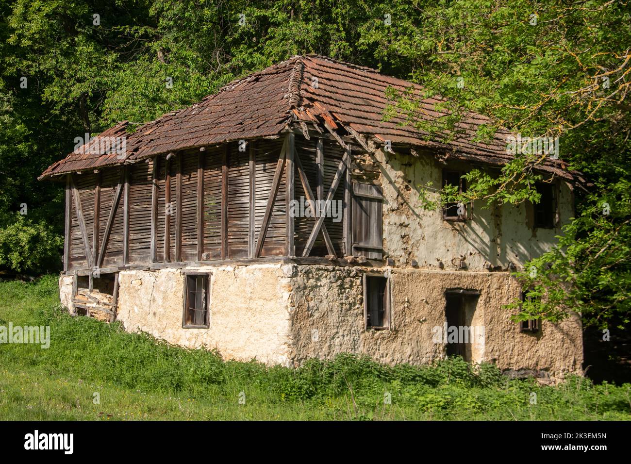 Haunted abounded old ruined empty house on country side, at the end of ...