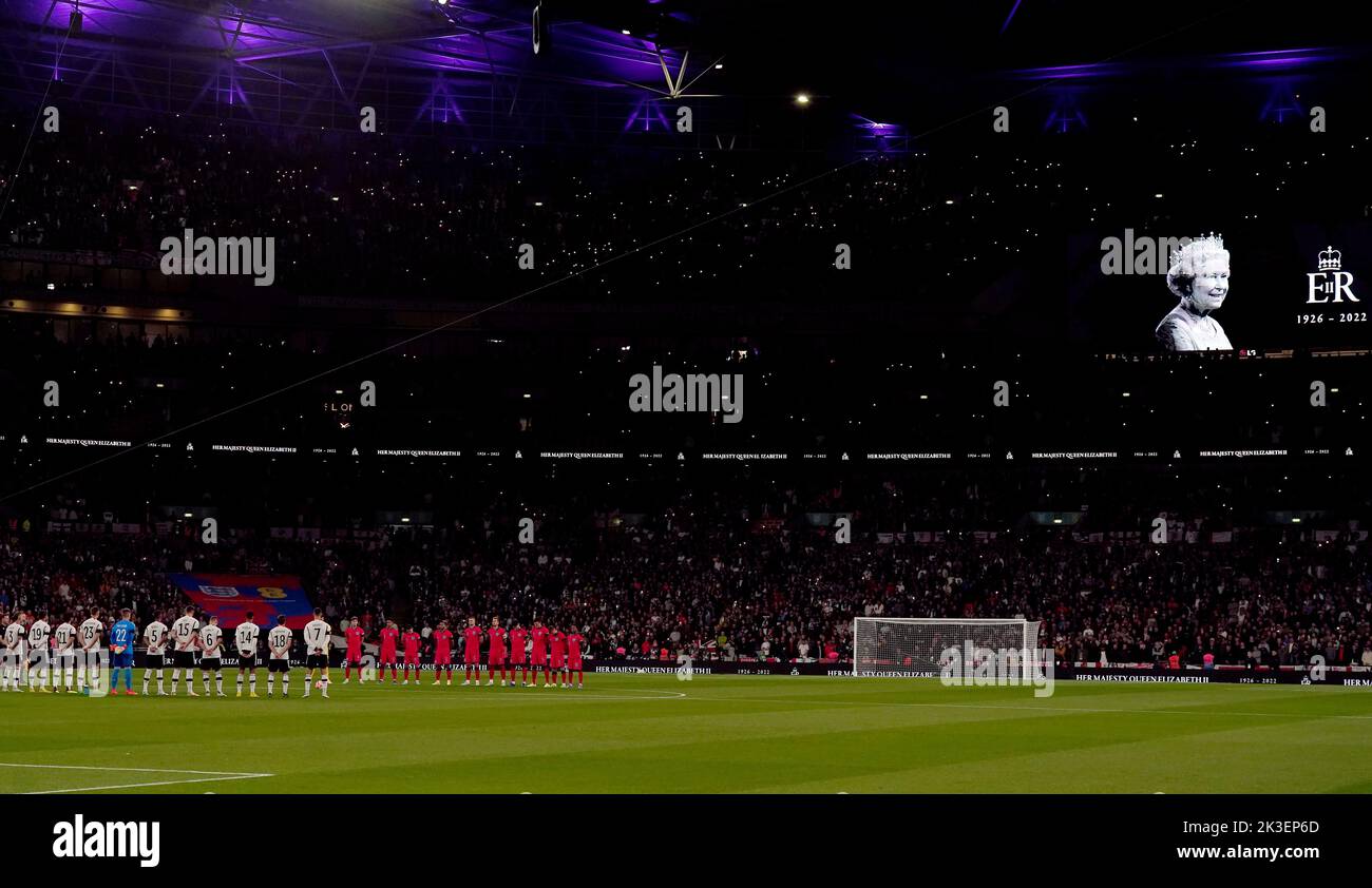 Players and fans observe a minutes silence for Queen Elizabeth II ...
