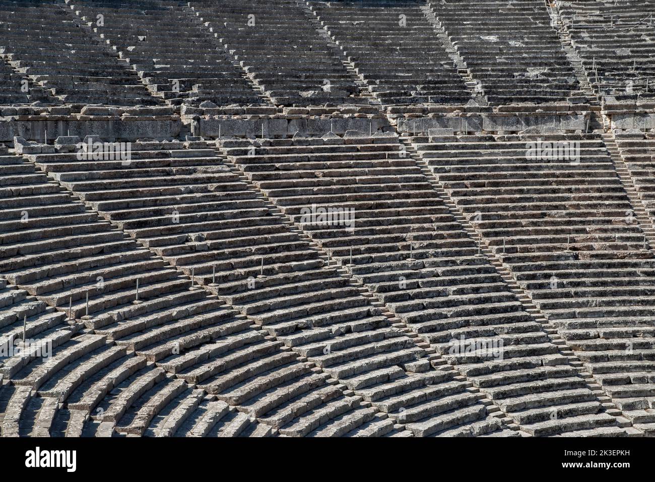 Stone seats of an ancient Greek theater in sunny day Stock Photo - Alamy