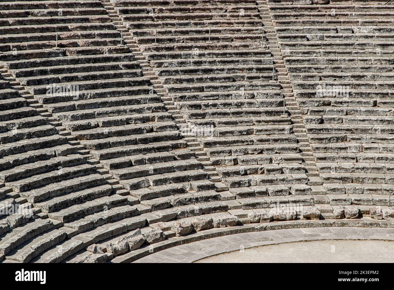 Stone seats of an ancient Greek theater in sunny day Stock Photo - Alamy