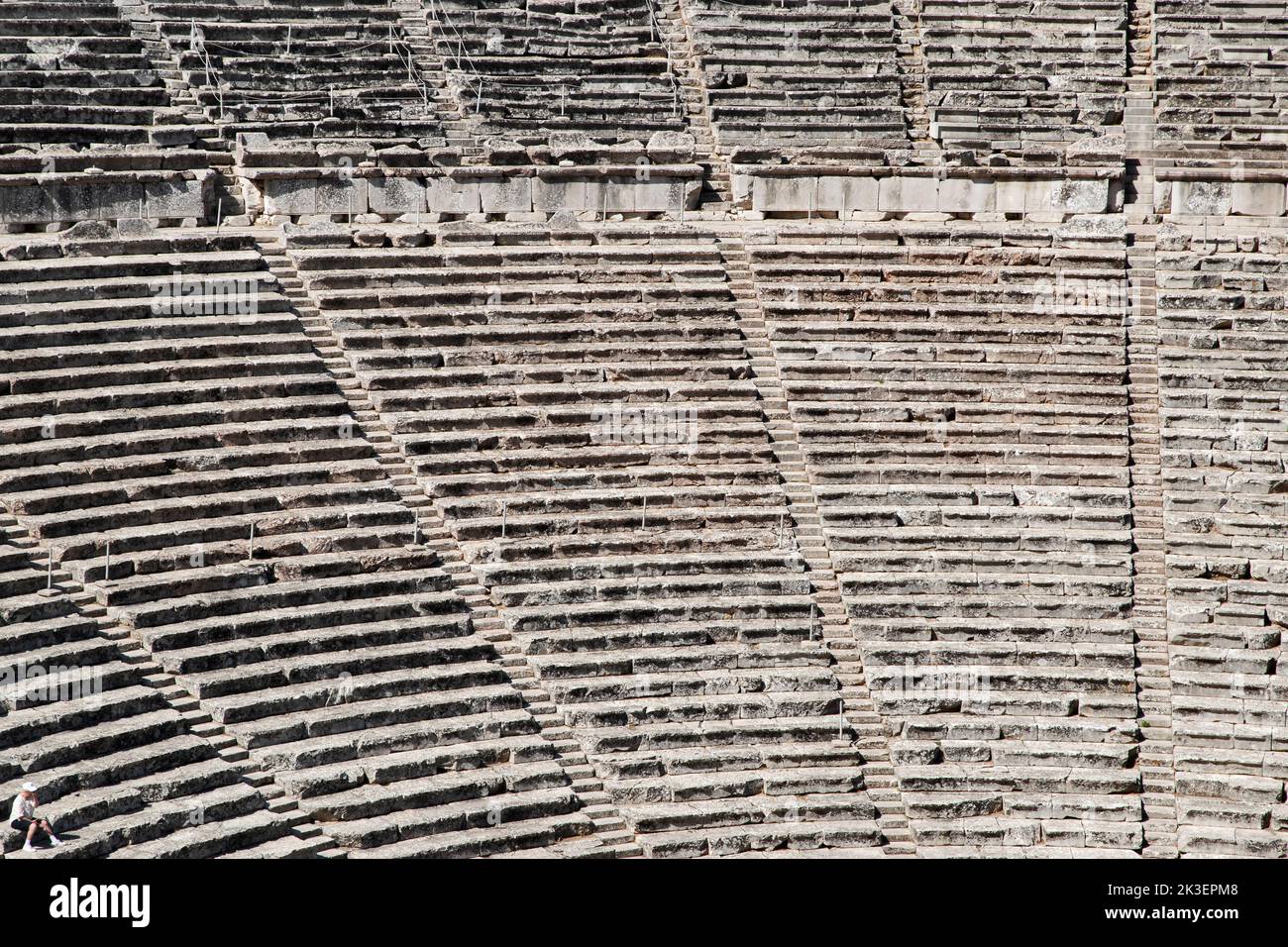 Stone seats of an ancient Greek theater in sunny day Stock Photo - Alamy
