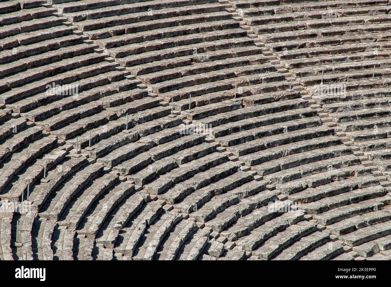Stone seats of an ancient Greek theater in sunny day Stock Photo - Alamy
