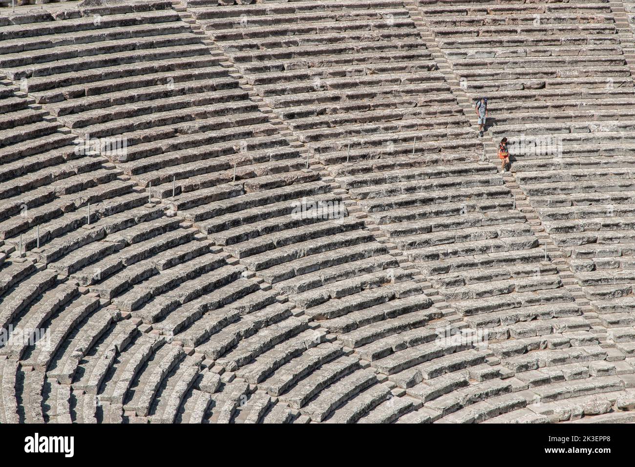 Stone seats of an ancient Greek theater in sunny day Stock Photo - Alamy