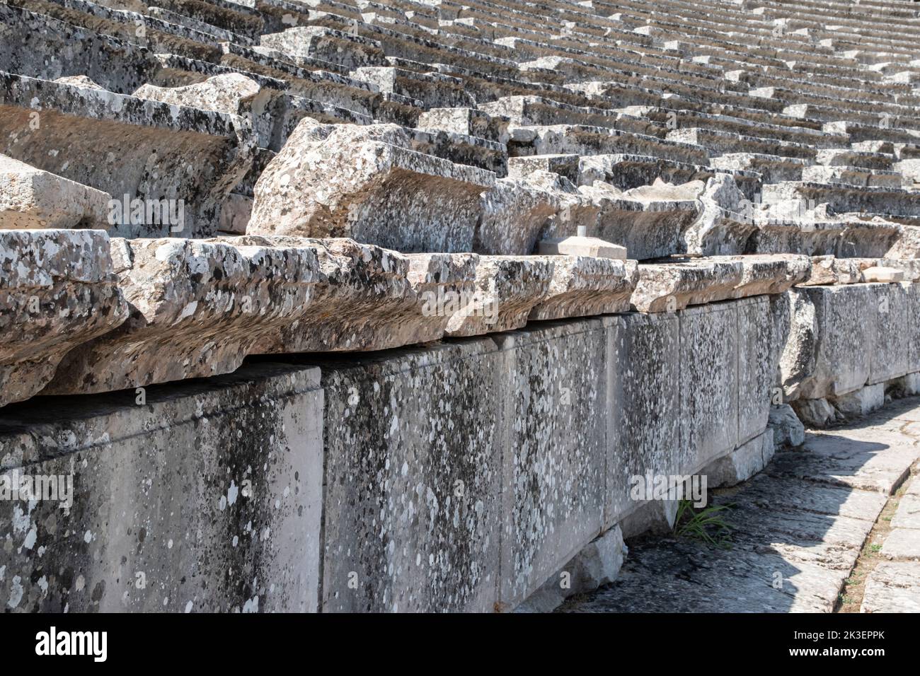 Stone seats of an ancient Greek theater in sunny day Stock Photo - Alamy