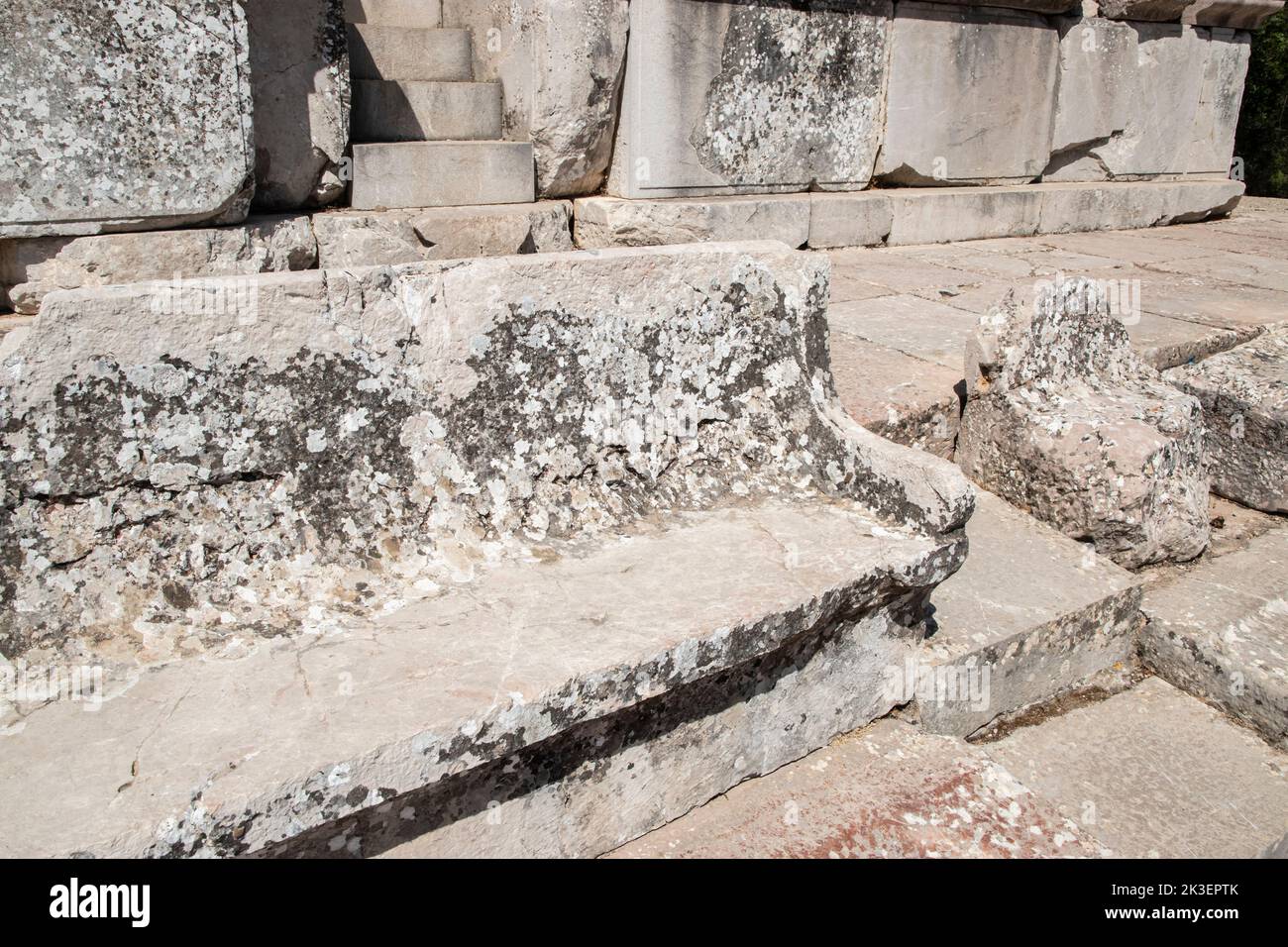 Stone seats of an ancient Greek theater in sunny day Stock Photo - Alamy