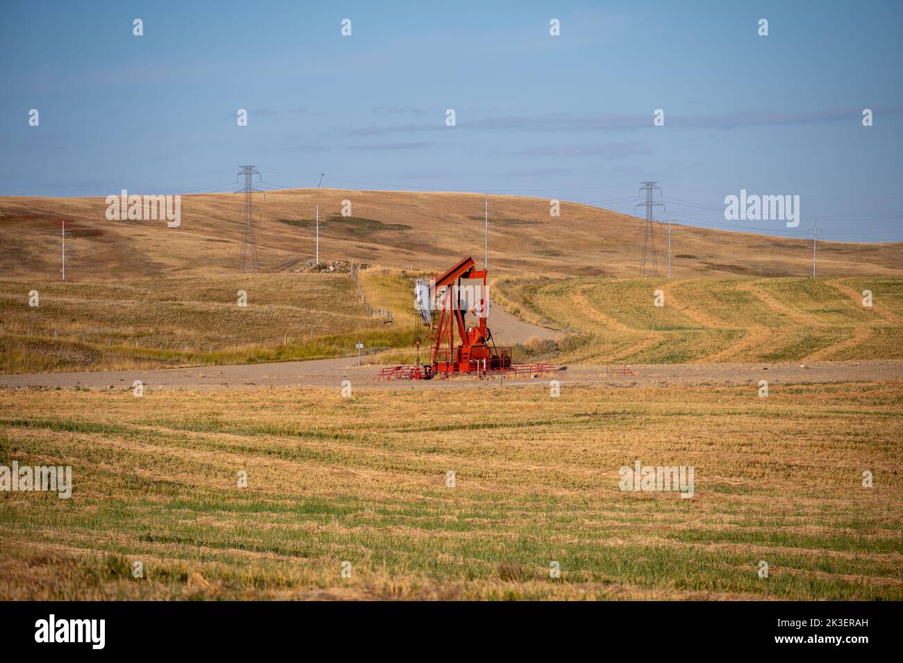 Oil well in rural Alberta Canada pumping oil and gas Stock Photo - Alamy