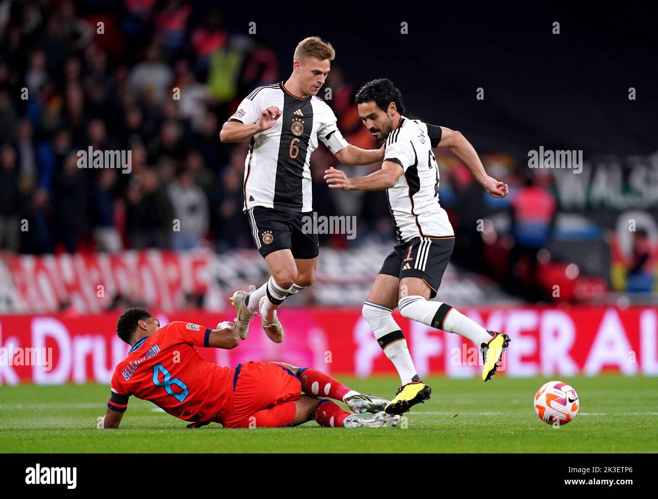 England's Jude Bellingham (left) battles for the ball with Germany's ...