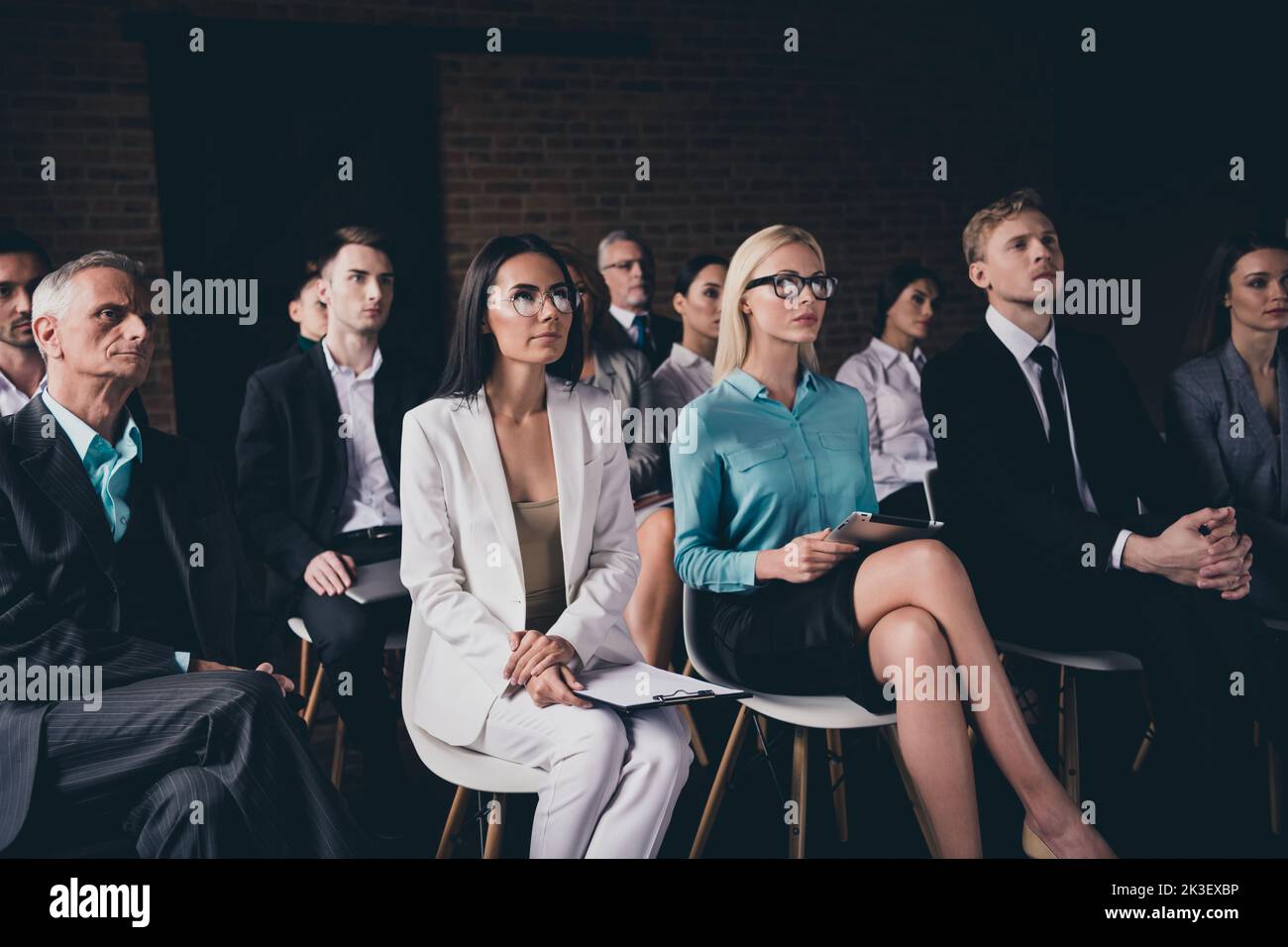 Portrait of businesspeople ceo boss chief attending event listening to ...