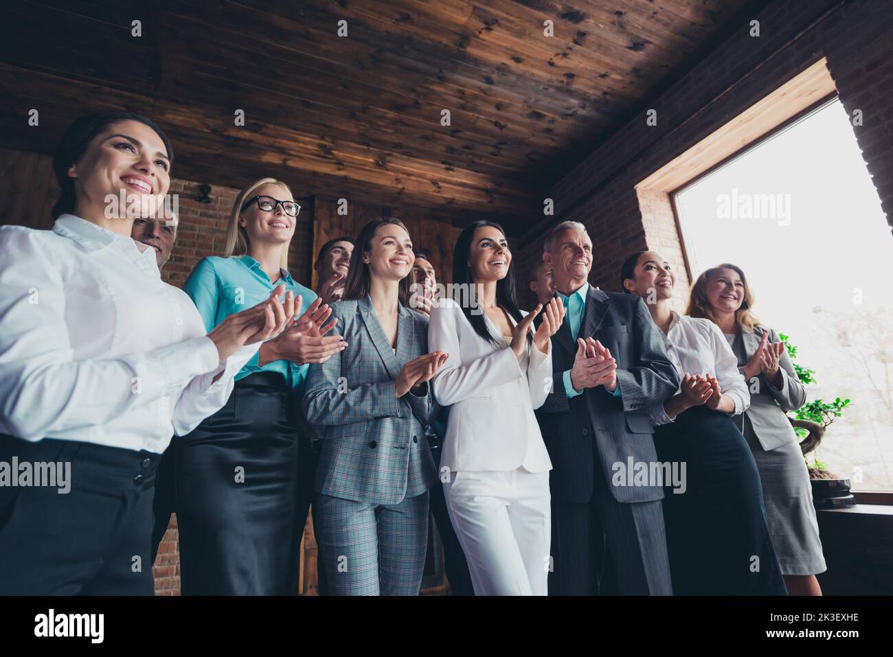 Photo of positive delighted business people standing conference room ...