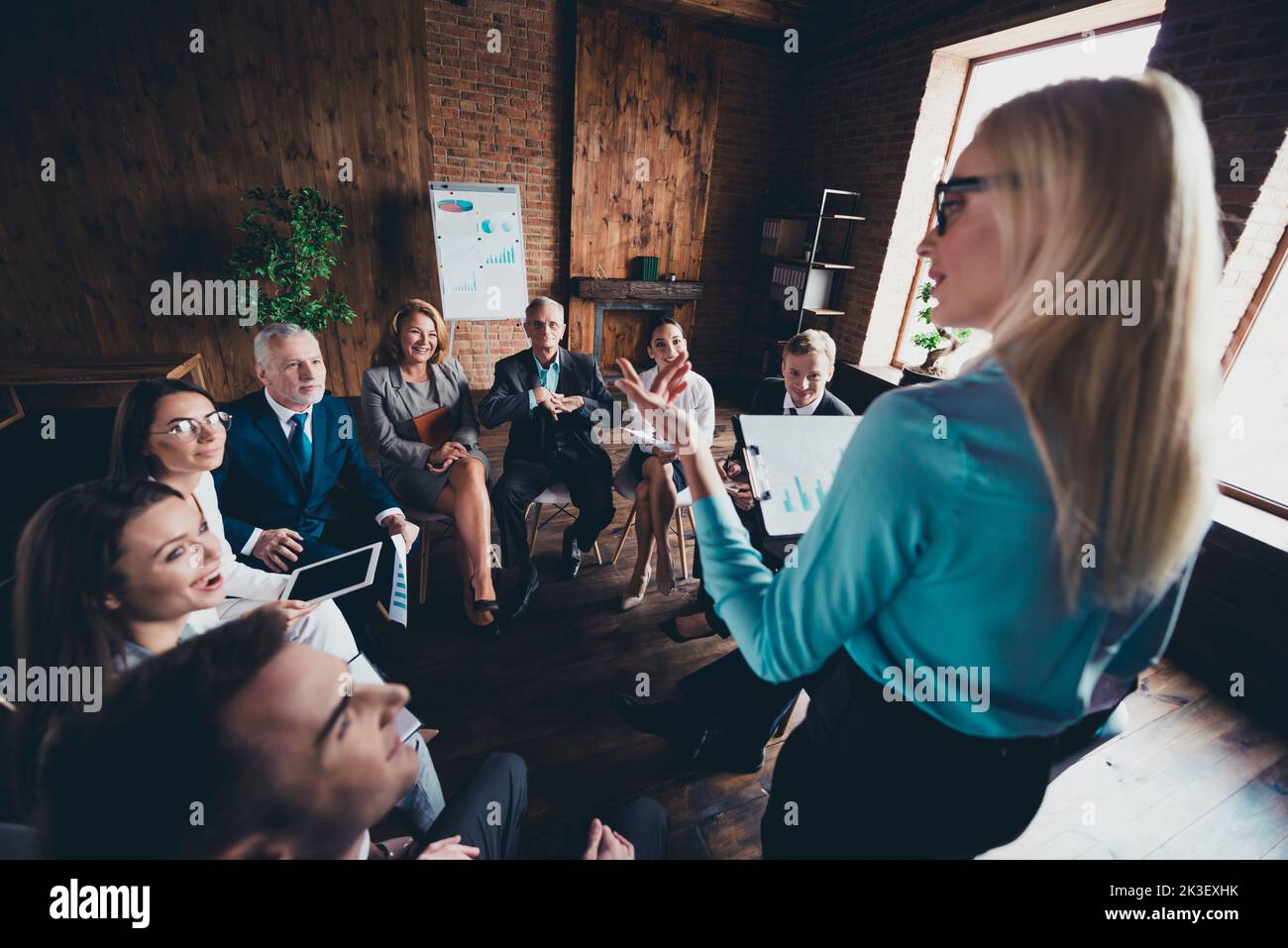 Portrait of crows business people sitting chair listen speaker coach ... Portrait of crows business people sitting chair listen speaker coach ...