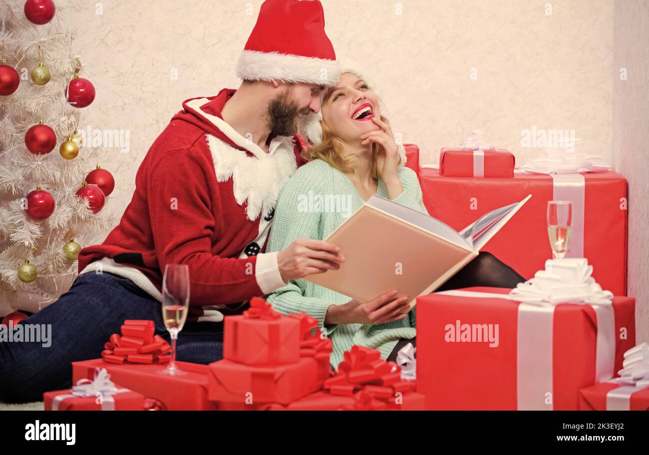 Couple in love enjoy christmas. Happy flashback. Family cuddle near ...