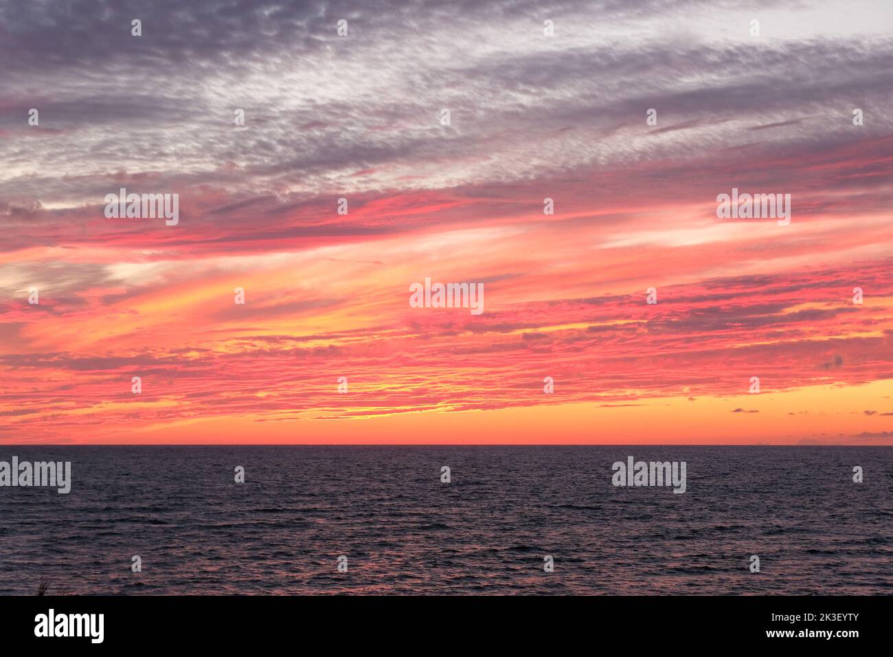 Red fire blood sunset with cloudy sky Stock Photo - Alamy