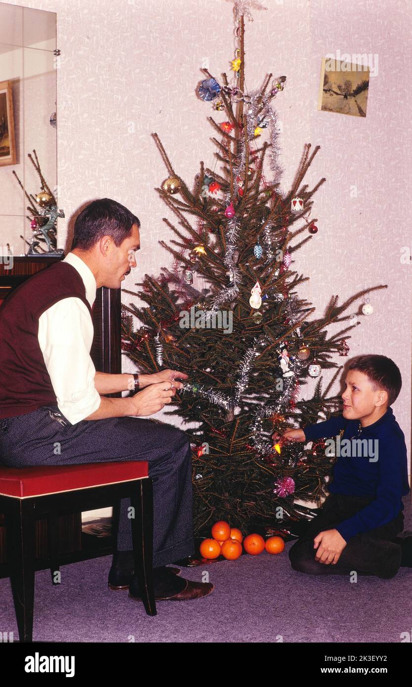 Father and son, Christmas time, Lyon, France, December 1968 Stock Photo ...