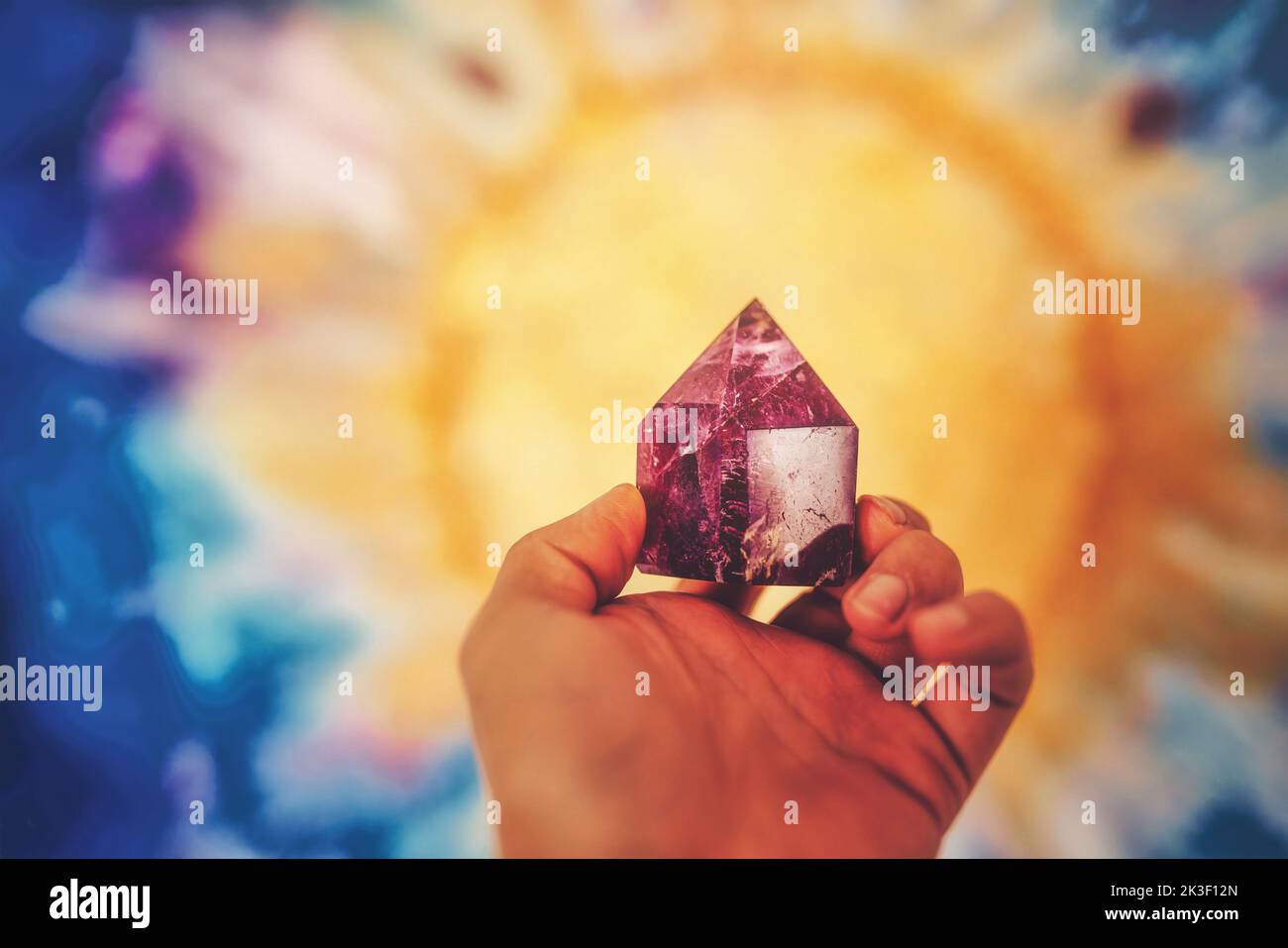 Hand holding amethyst hi-res stock photography and images - Alamy