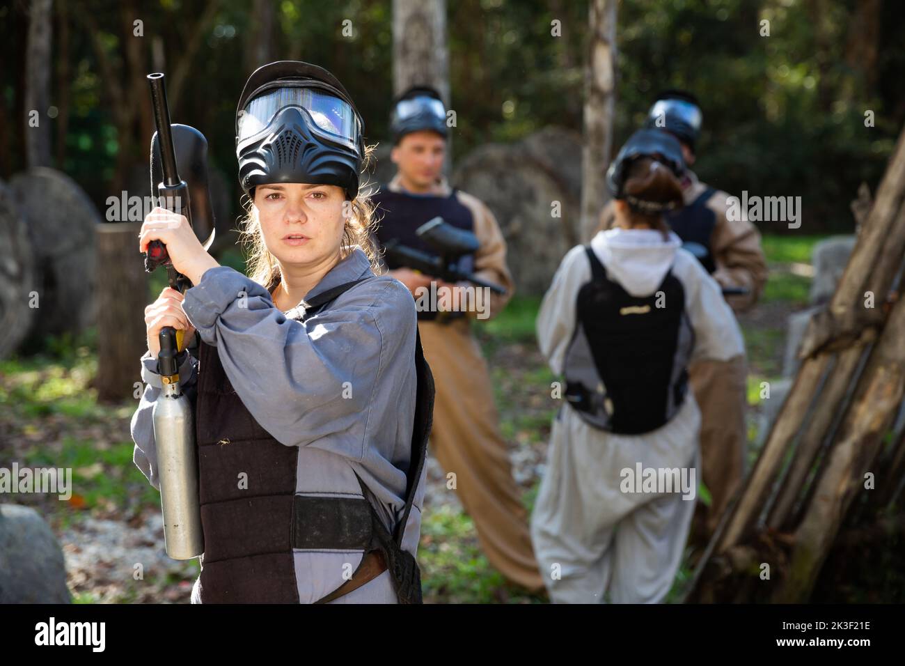 Portrait of girl at paintball shooting range Stock Photo - Alamy