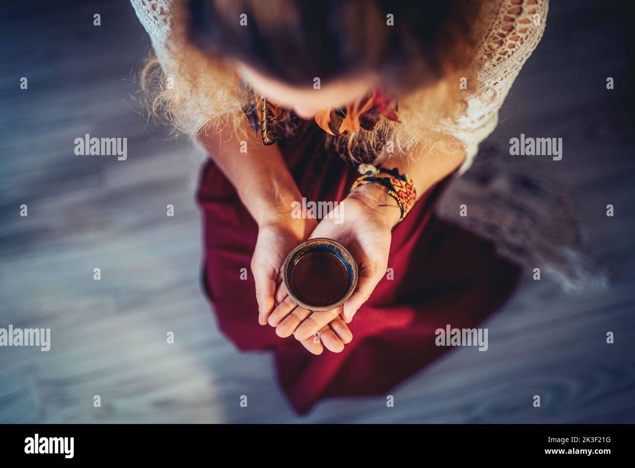 Cacao ceremony, heart opening medicine. Ceremony space. Cacao cup in ...