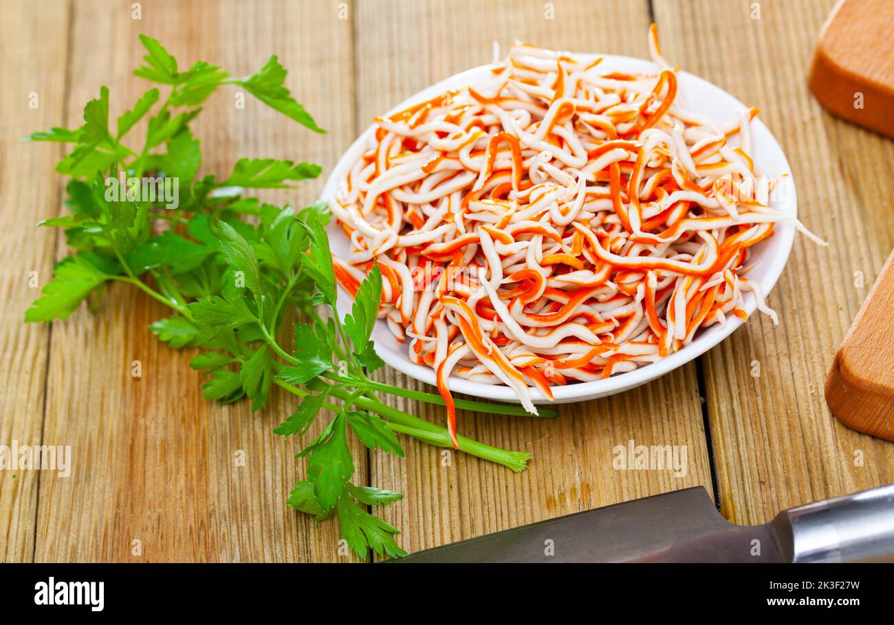 Raw Angula eel fry ready for cooking on table Stock Photo - Alamy