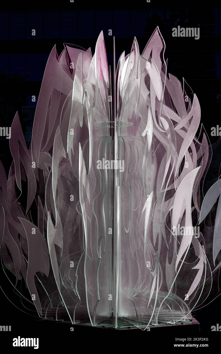 Abstract modern sculpture with angular shapes colored in white and ...