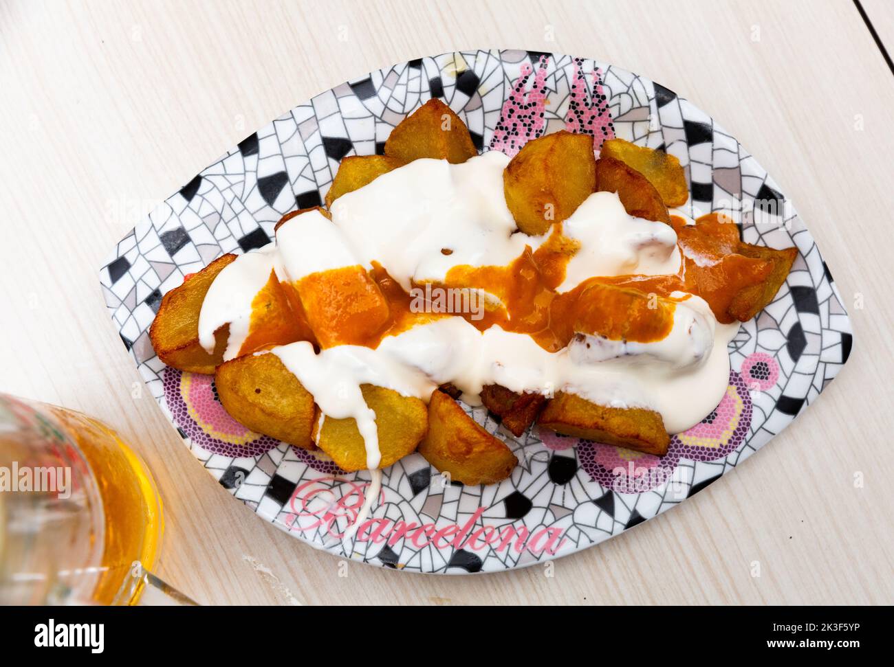 Spicy fried potatoes Patatas bravas with sauces Stock Photo - Alamy