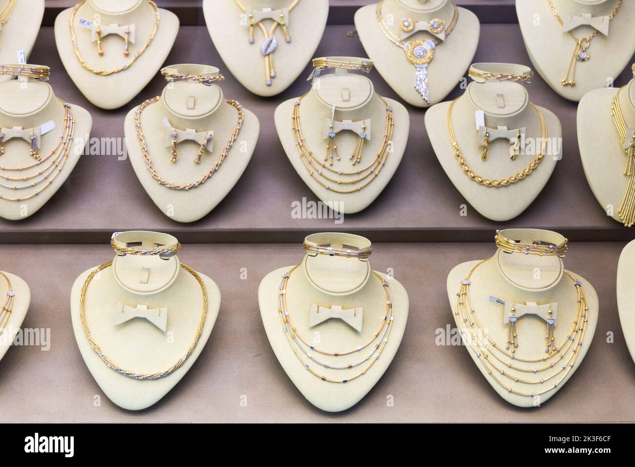 Variety of gold jewelry displayed for sale Stock Photo - Alamy