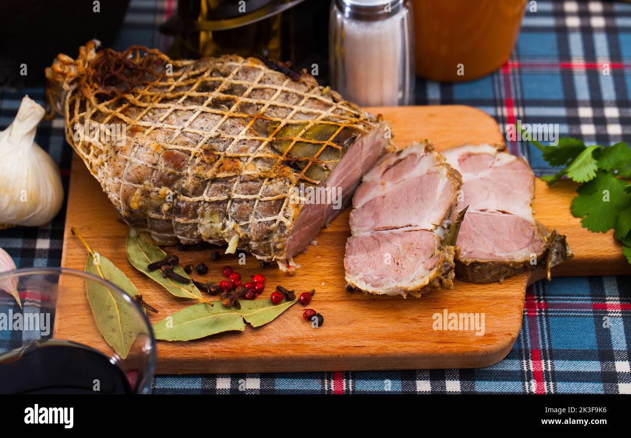 Pork baked in oven in large piece Stock Photo - Alamy
