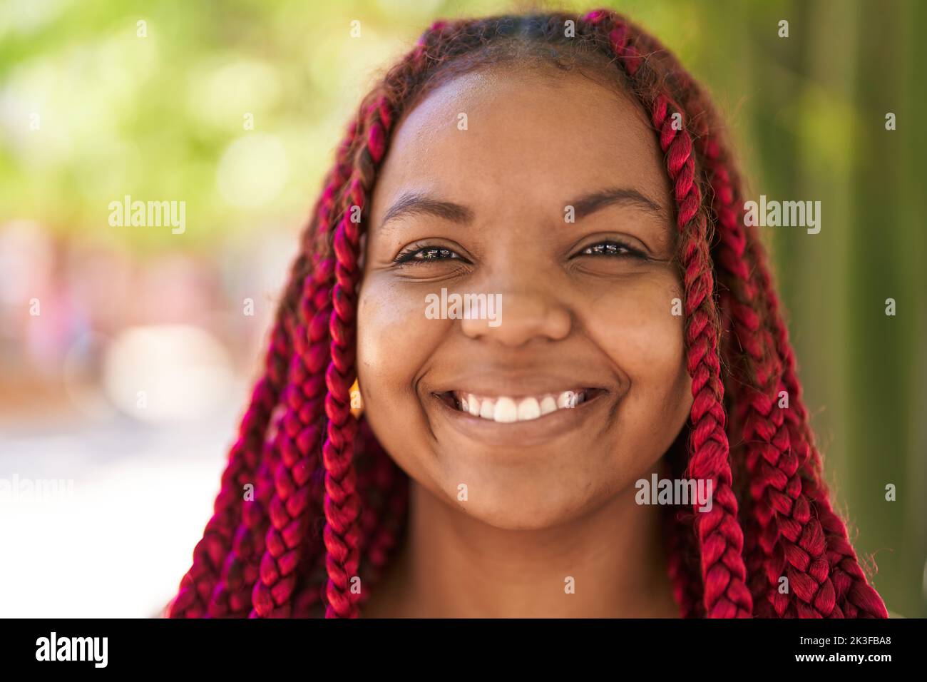 African american woman smiling confident standing at park Stock Photo ...