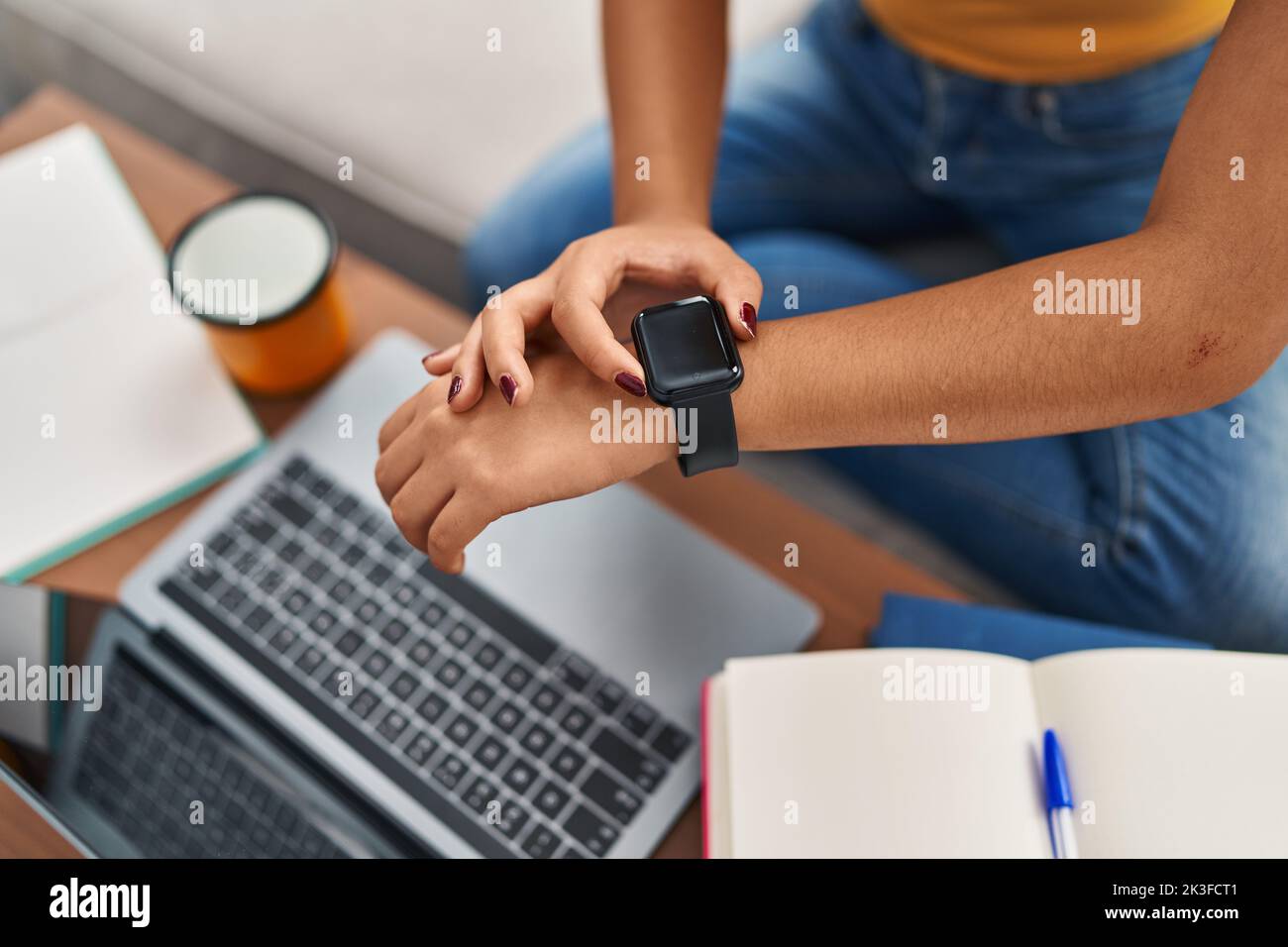 Asian woman using smartwatch sitting hi-res stock photography and ...