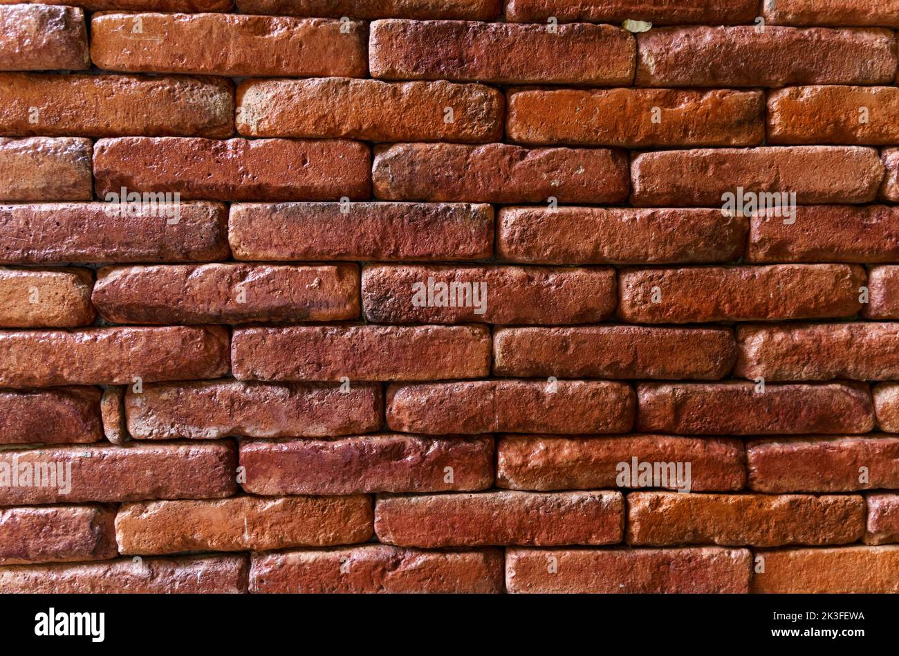 The texture of a wall made of red bricks. Texture and backgrounds Stock ...