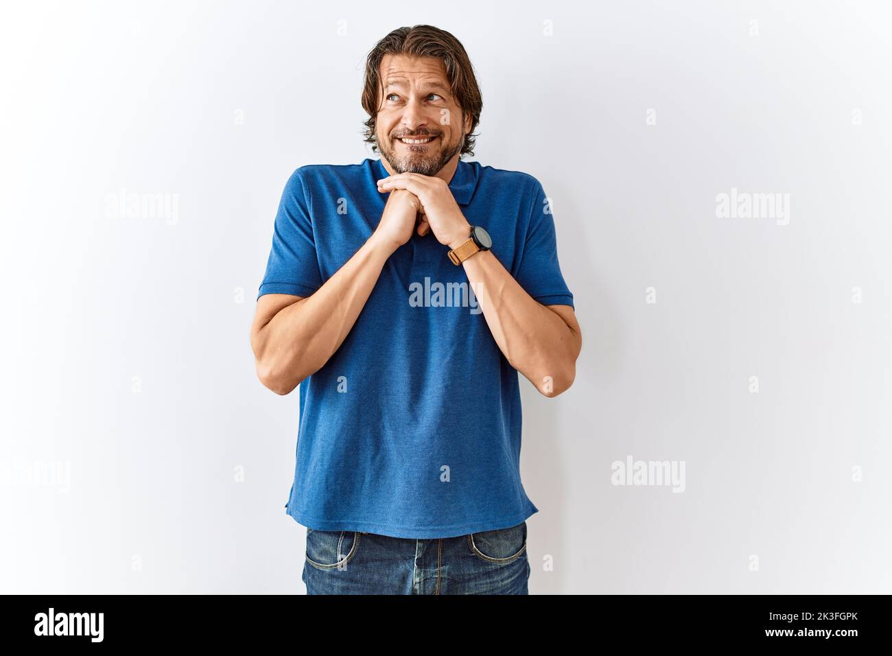 Handsome middle age man standing together over isolated background ...