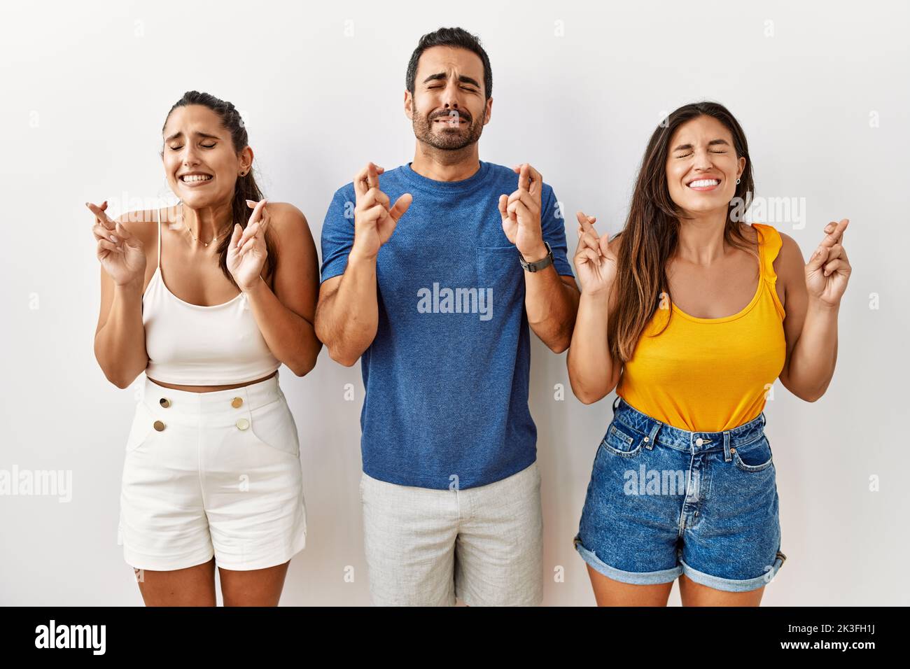 Group of young hispanic people standing over isolated background ...