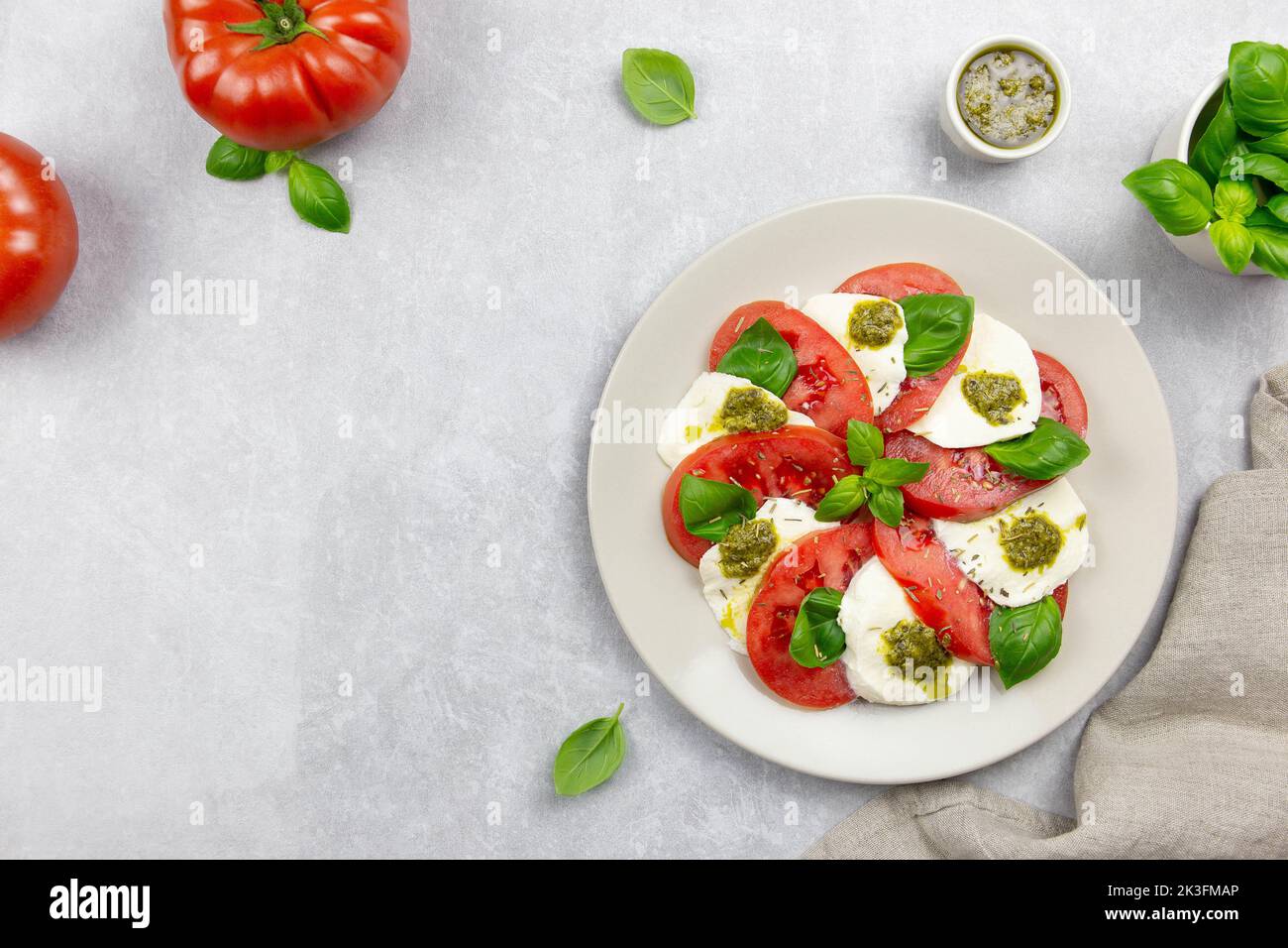 Traditional italian caprese salad with sliced tomatoes, mozzarella ...