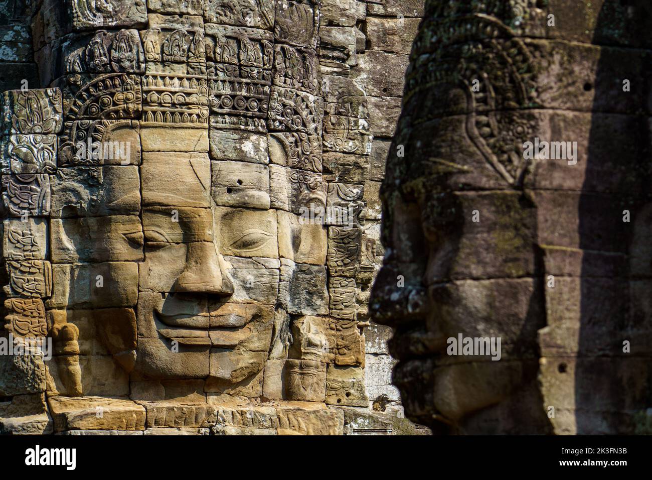 Cambodia. Siem Reap. The archaeological park of Angkor. Heads of Buddha ...
