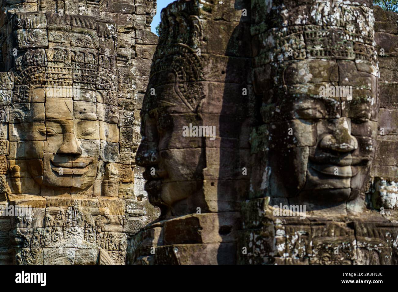 Cambodia. Siem Reap. The archaeological park of Angkor. Heads of Buddha ...