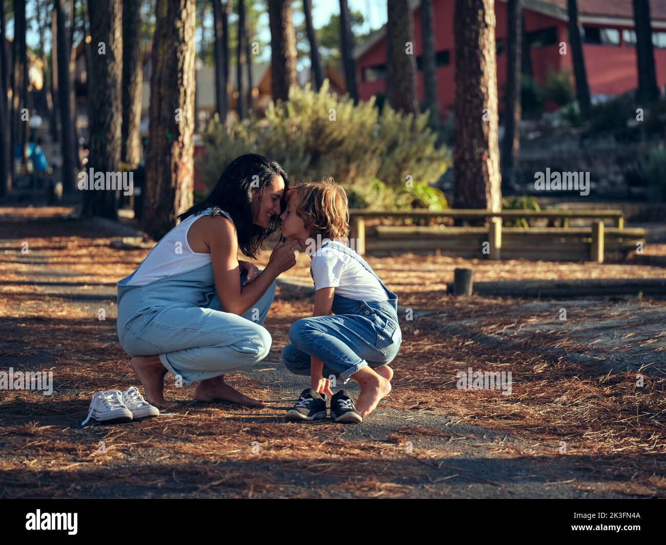 Boy crouch tree hi-res stock photography and images - Alamy